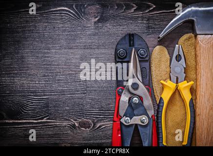 Safety gloves pliers steel wire cutter claw hammer copy space Stock ...