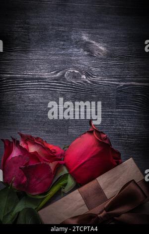 Bloomed rosebud on wooden board holiday concept Stock Photo - Alamy