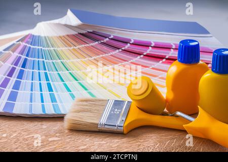 bottles of paint paintbrush paintroller color palette Stock Photo - Alamy