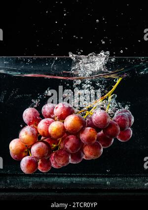 Air bubbles in water on black background Stock Photo - Alamy