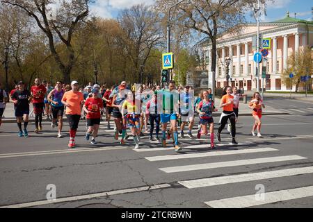 People run together in an organized mass running event for running ...
