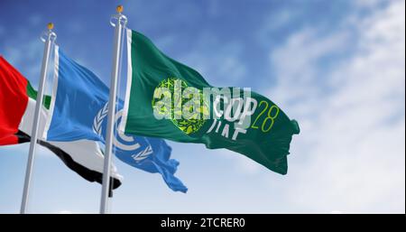Dubai, UAE, Nov. 30 2023: Flags of COP28, UNFCCC and UAE waving on a ...