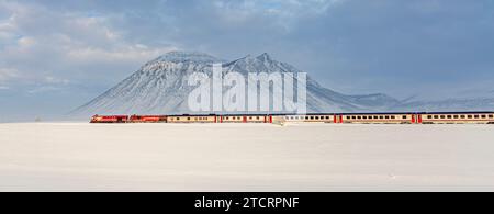 Snow-covered Kirkor Mountain in the background and Van Lake Express ...