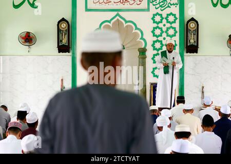 Jamiul Azhar mosque. The friday prayer (salat). Muslim man praying in ...