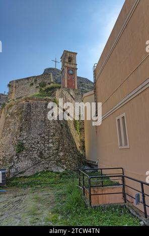 Exploration of ancient wall structure overlooking the city in bright ...