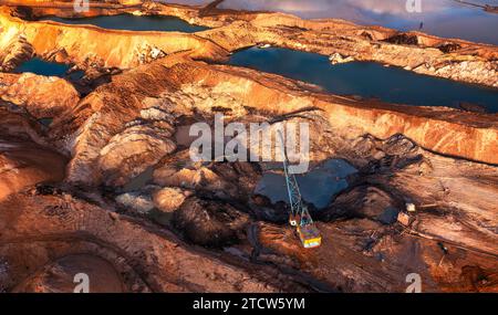 A view of an ilmenite open pit mine in a canyon in the central region ...