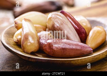 wooden spoon with boiled pine nuts, traditional Brazilian cooking ...