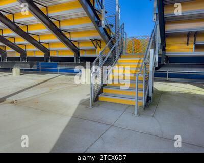 Example of an exit, entrance, vomitorium at empty set of metal stadium ...