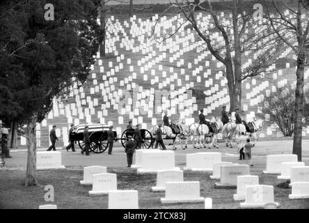 A horse-drawn caisson with the flag-draped casket of former President ...
