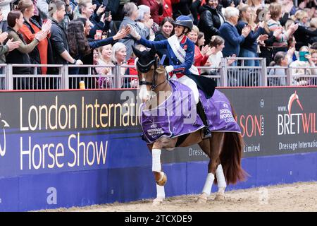 Charlotte Dujardin of Great Britain with Imhotep competes during the ...