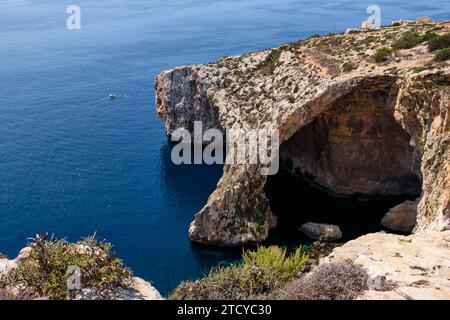 The natural arch of the Blue Grotto photographed from the Blue Wall and ...