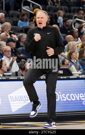 St. Thomas - Minnesota Tommies head coach John Tauer looks on during an ...