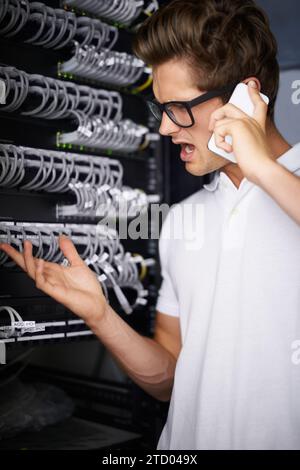 Server room, thinking and confused man with cables for connectivity ...