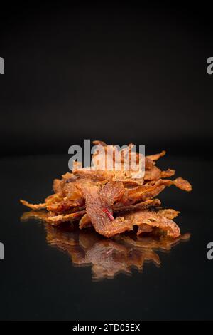 Bowl with spicy beef jerky on white wooden background Stock Photo - Alamy