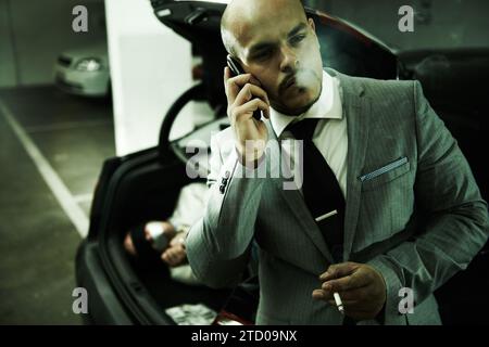 Smoking, car and man with hostage in trunk for negotiation, kidnapping ...