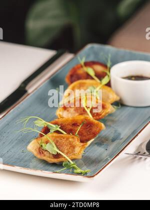 Gyoza are cooked at a Chinese Restaurant in Tokyo on July 1, 2026 ...