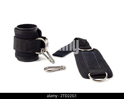 Leg loops with D-rings, leg cuffs and carabiners on a white background ...
