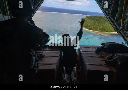 Parachutes of the U.S. military drop humanitarian supplies into the ...