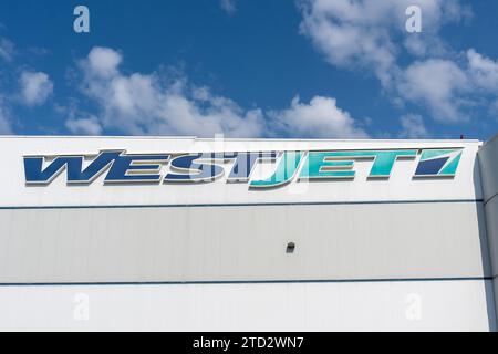 Close up of WestJet sign on the building at its World Headquarters in ...