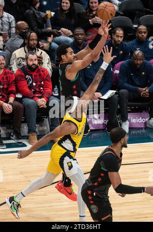 Washington Wizards guard Jordan Poole (13) dribbles against Atlanta Hawks forward Georges Niang ...