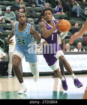 Furman Paladins guard JP Pegues (1) shoots a three-pointer over Tulane ...
