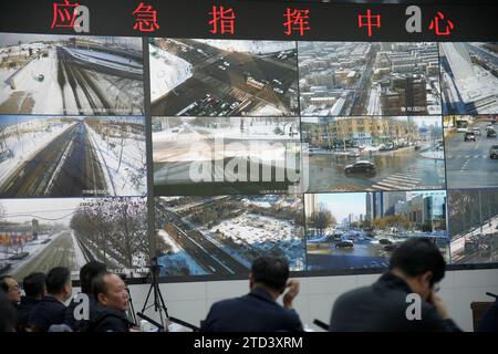 YANTAI, CHINA - DECEMBER 16, 2023 - Staff members monitor and dispatch ...