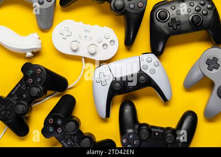Different generations of game controllers of the Playstation game ...