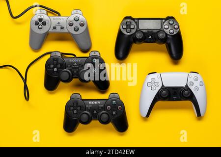 Different generations of game controllers of the Playstation game ...