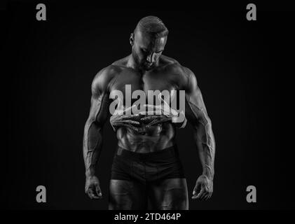 Perfect abdomen. Female hands embracing, touching muscular man abs ...