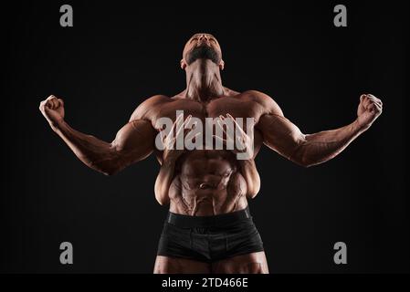 Perfect abdomen. Female hands embracing, touching muscular man abs ...