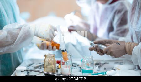 Liposuction and lipofilling concept, surgery in the operating room, fat ...