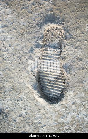 Footstep pattern seen on a concrete background Stock Photo - Alamy