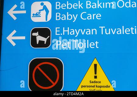 Baby care and pet toilet directional signs, bilingual sign in IST ...