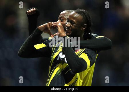 Watford's Ismael Kone (right) celebrates scoring their side's fifth ...