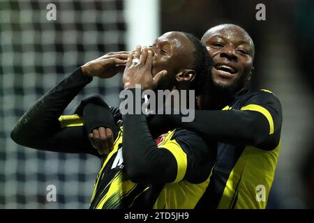 Watford's Edo Kayembe celebrates scoring their side's third goal of the ...