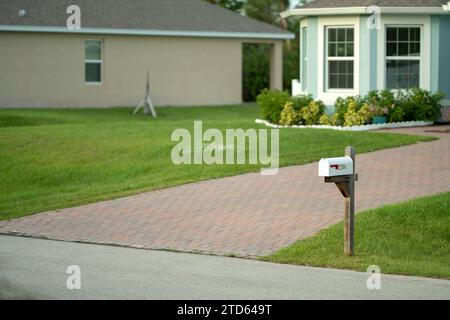 Typical american outdoors mail box on suburban street side Stock Photo ...
