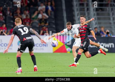 Marcus Antonsson of the Wanderers competes for the ball with Nicholas ...
