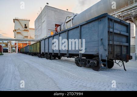 Freight gondola cars for limestone loading stand at factory Stock Photo ...