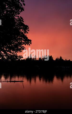 Rain and sunset on Fawn Lake, Olympic Peninsula, Washington State, USA ...