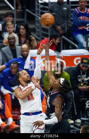 New York Knicks' Jalen Brunson (11) defends Orlando Magic's Desmond ...