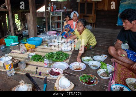Thai family having a meal in the village Isan provinces Northern ...