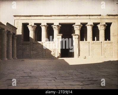 The facade of the pronaos of the Temple of Edfu in Egypt is depicted in ...
