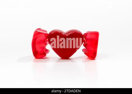 Love Concept with Gummi Bears and red heart Stock Photo - Alamy