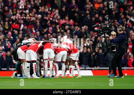 Arsenal players in a group huddle before kick off during the UEFA ...