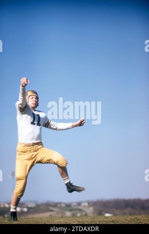 ANNAPOLIS, MD - MARCH, 1955: Quarterback George Welsh #11 of the Navy ...