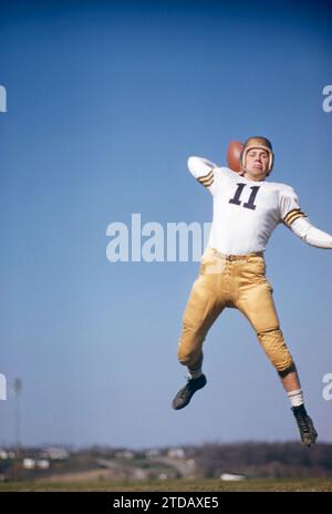 ANNAPOLIS, MD - MARCH, 1955: Quarterback George Welsh #11 of the Navy ...
