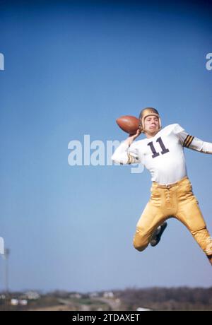 ANNAPOLIS, MD - MARCH, 1955: Quarterback George Welsh #11 of the Navy ...