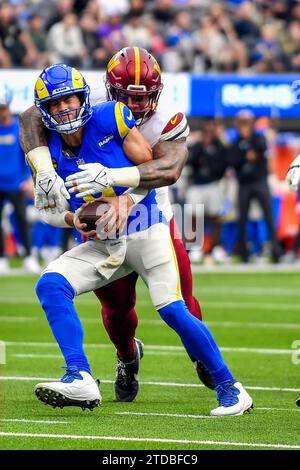 Washington Commanders cornerback Christian Holmes (34) recovers a ...