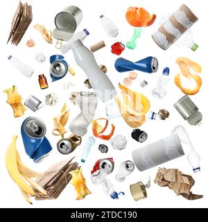 Lots of different garbage flying on white background Stock Photo - Alamy