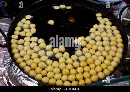 arabic street food Logma or Legaimat (Lugaimat) preparation, is one of ...